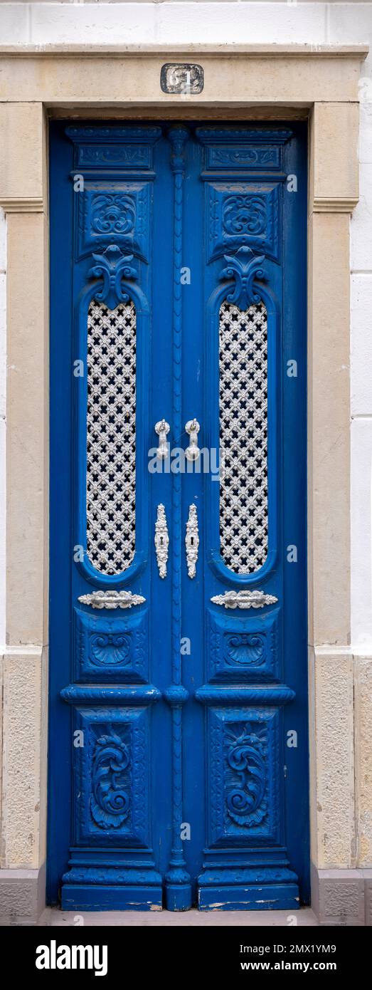 Close view of beautiful details of typical doors and azulejo tiles ...