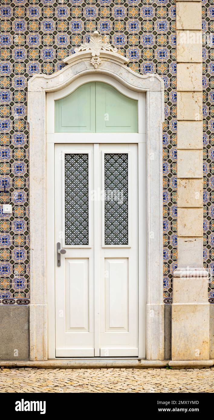 Close view of beautiful details of typical doors and azulejo tiles ...