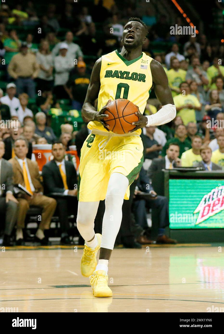 Baylor's Jo Lual-Acuil Jr. (0) of Australia drives to the basket for a ...