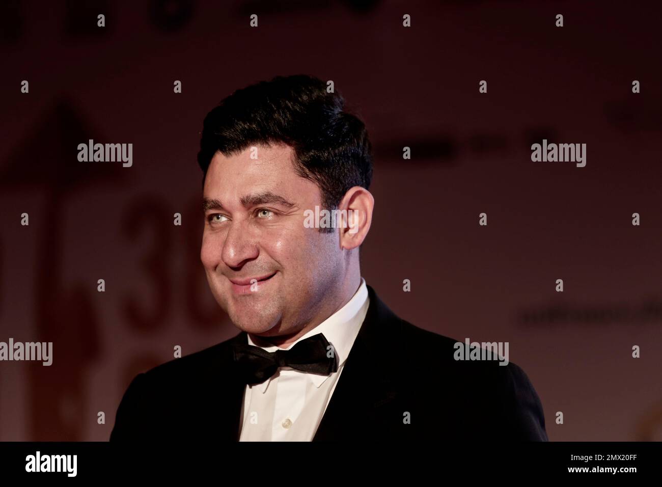 Egyptian actor Ahmed Shaker smiles on the red carpet during the opening ...