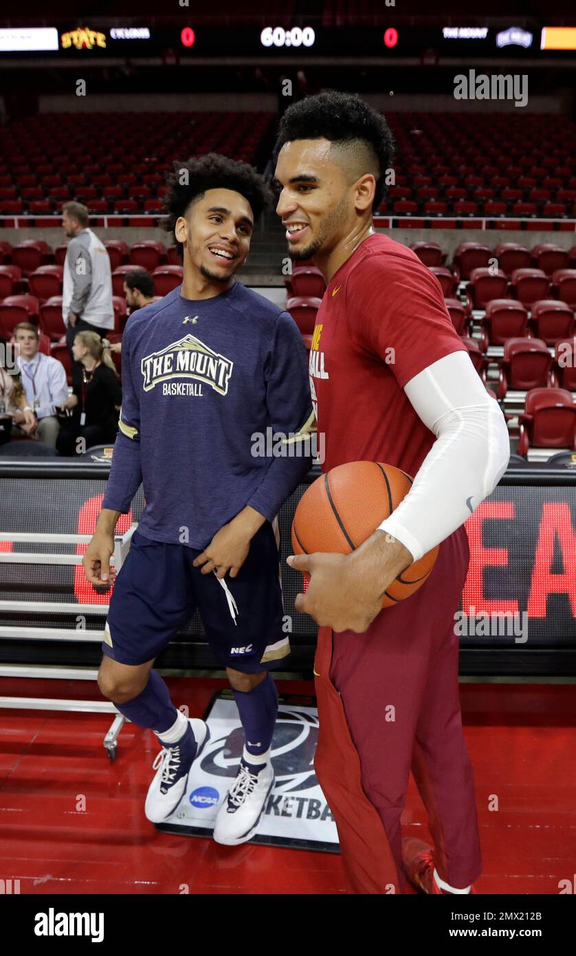 Mount St. Mary's guard Elijah Long, left, talks with his brother Iowa ...