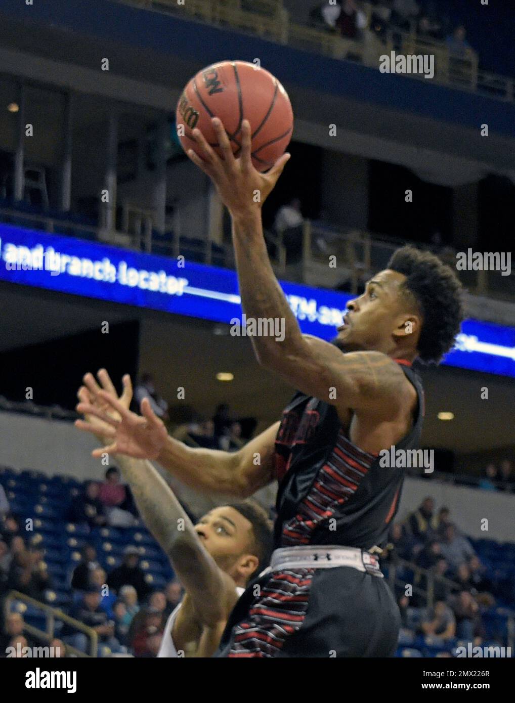 Gardner Webb guard David Efianayi (11) drives to the basket during the ...