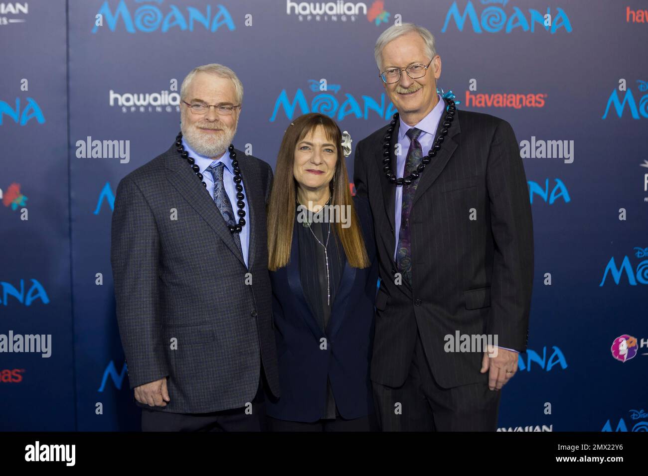 Ron Clements, from left, Osnat Shurer, and John Musker arrive at the ...