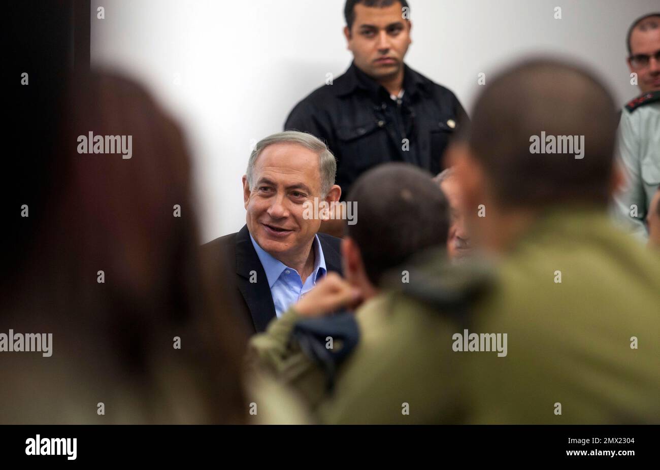Israeli Prime Minister Benjamin Netanyahu speaks with soldiers during a ...