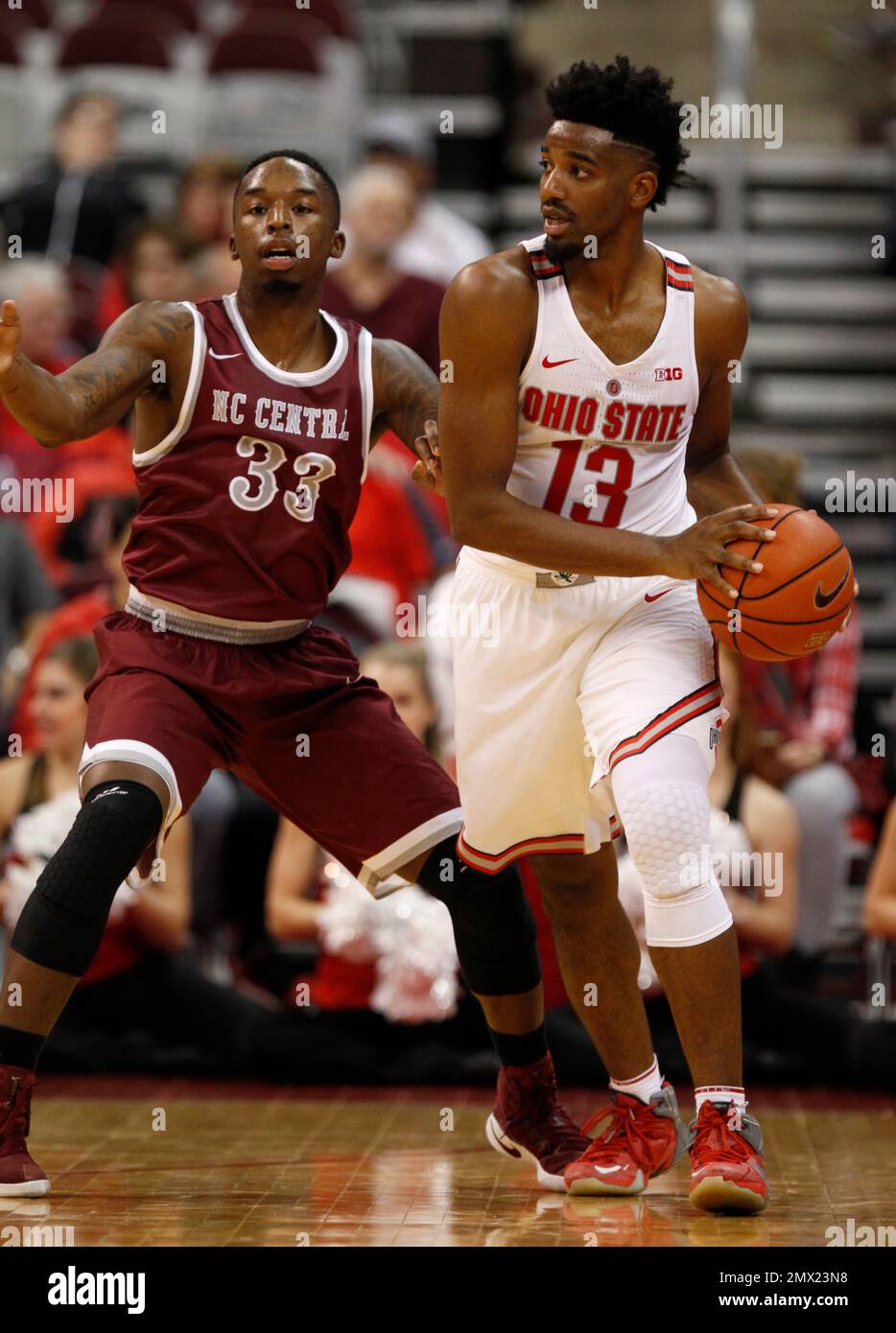 Ohio State guard JaQuan Lyle, right, works against North Carolina ...