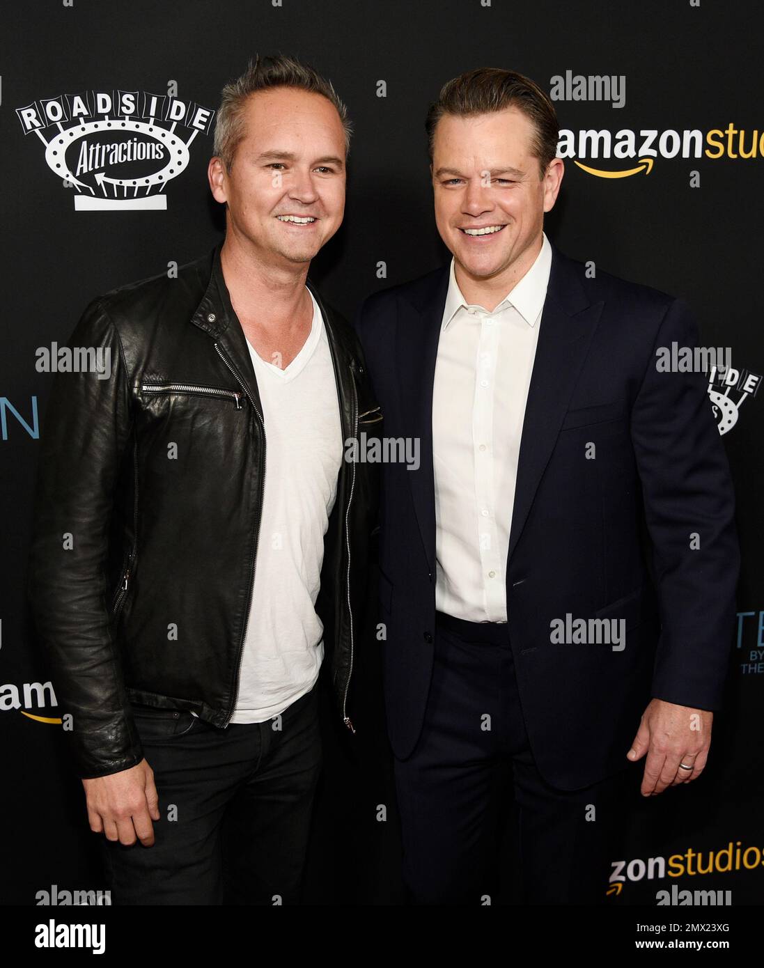Roy Price, left, head of Amazon Studios, poses with Matt Damon ...