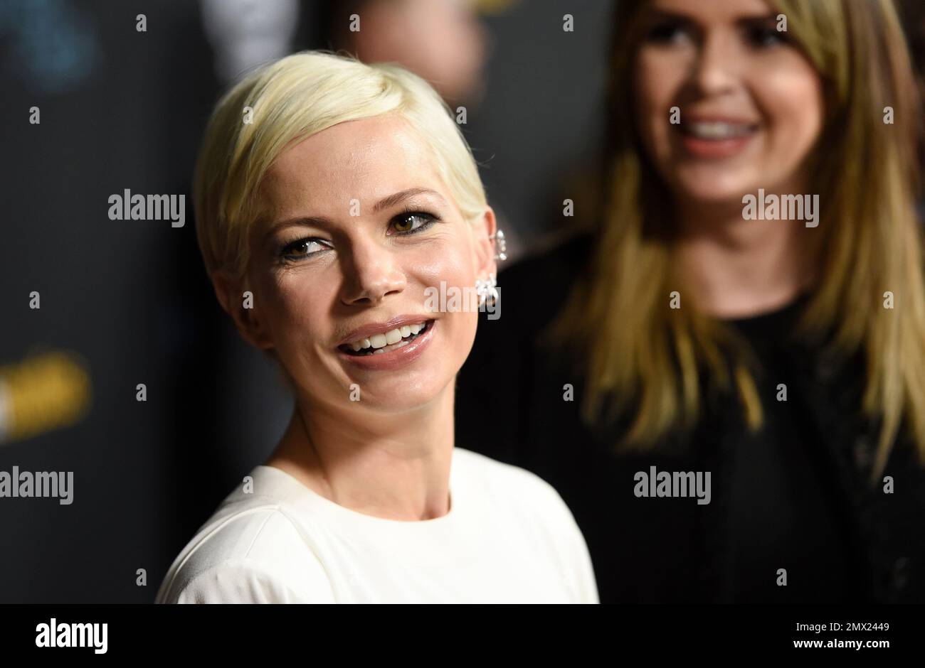 Michelle Williams, a cast member in "Manchester by the Sea," looks down ...
