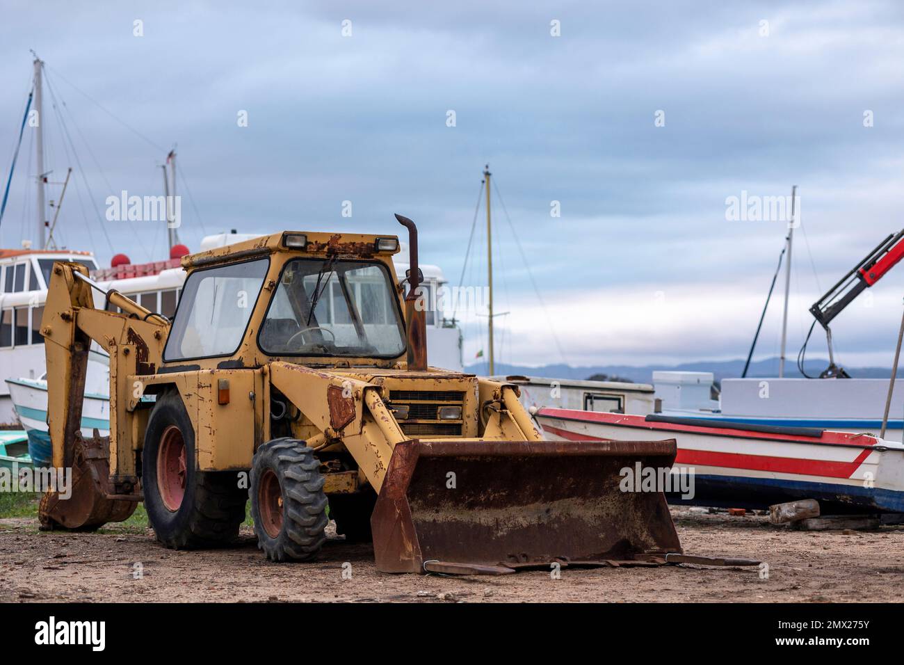 View of an orange old rusty bulldozer used for construction work Stock ...