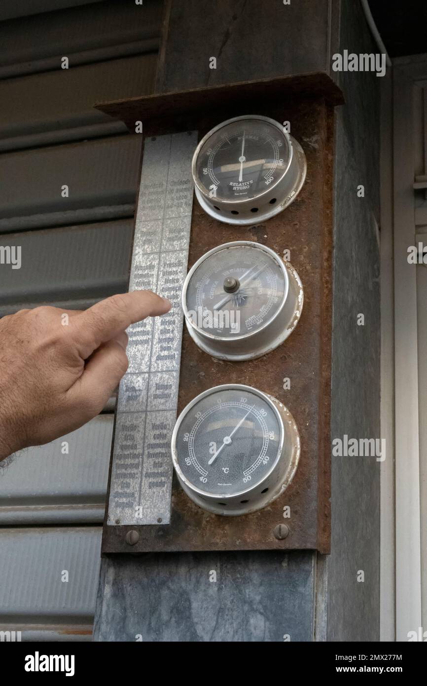 View of rusty vintage meters for temperature, humidity and pressure ...