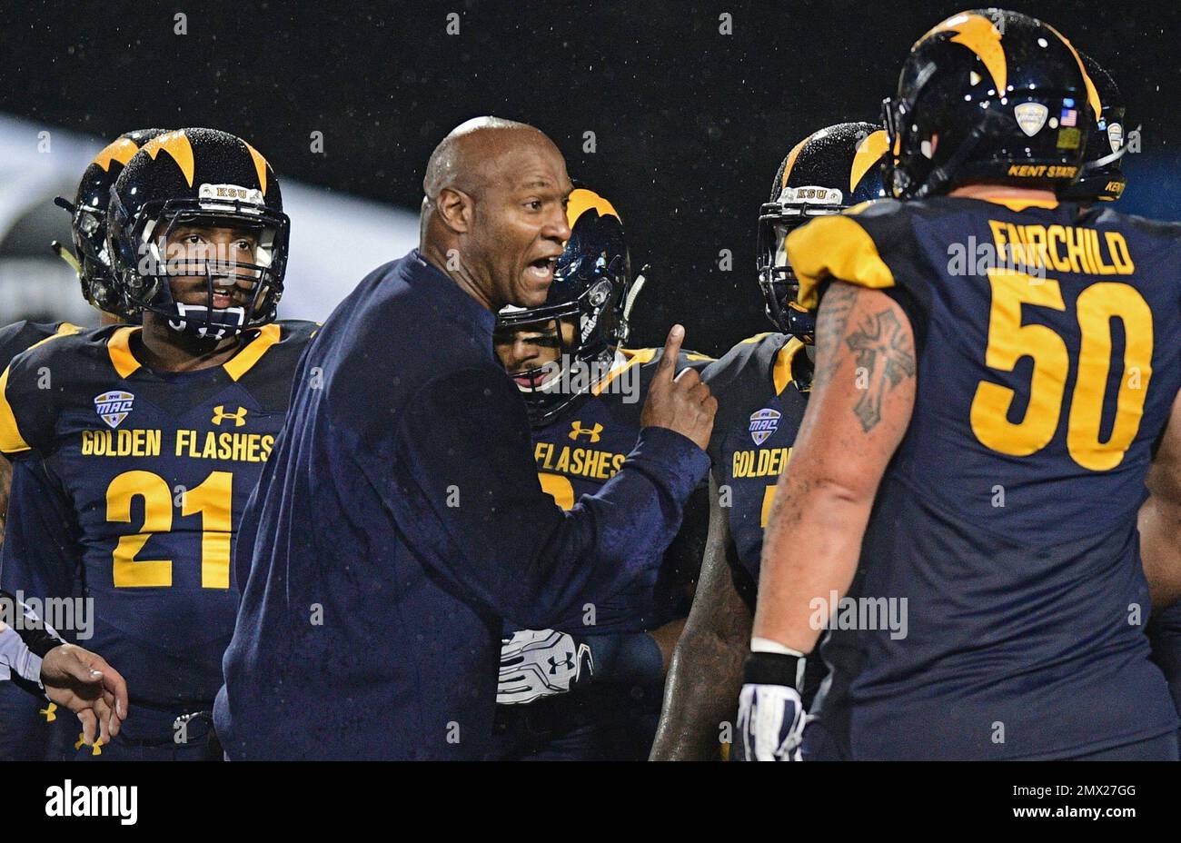 Kent State head coach Paul Haynes talks to the defense in the third ...