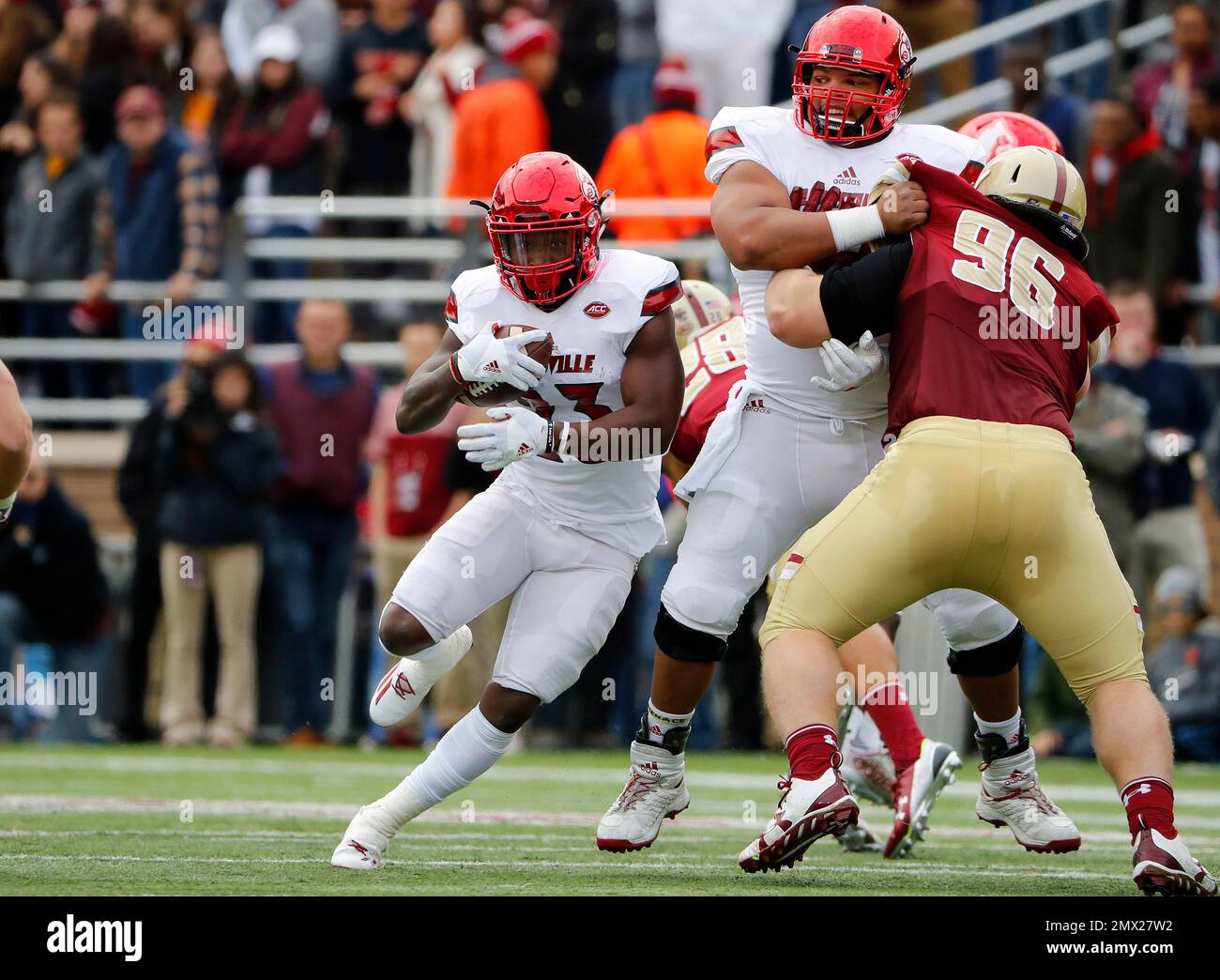Louisville running back Brandon Radcliff carries the ball against the ...