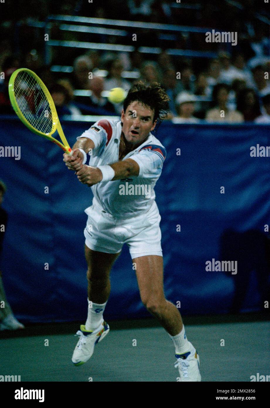Jimmy Connors of Belleville, Ill., returns a shot against Paul Haarhuis ...