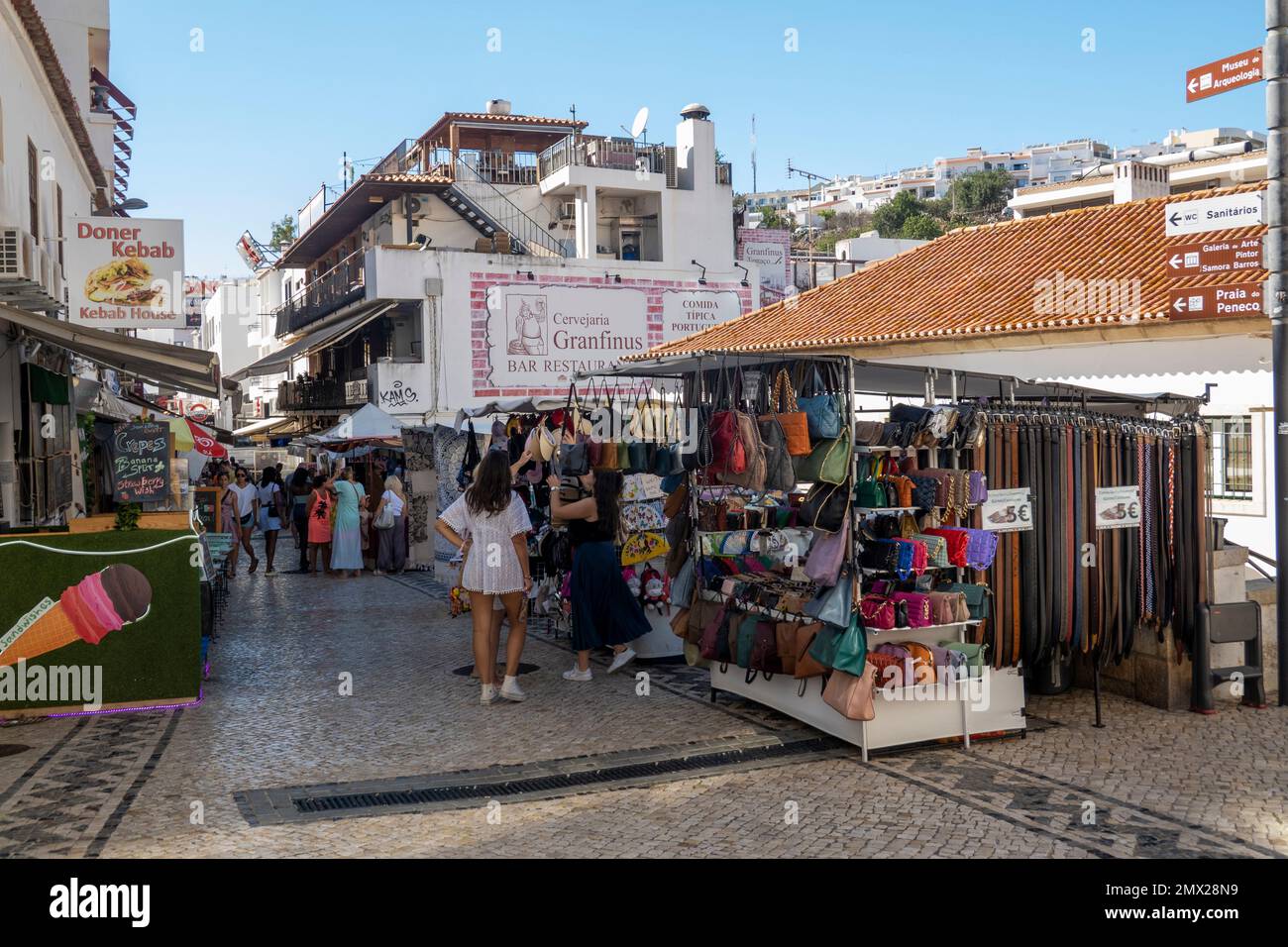 ALBUFEIRA, PORTUGAL - 15th August 2022: Typical shopping narrow streets ...