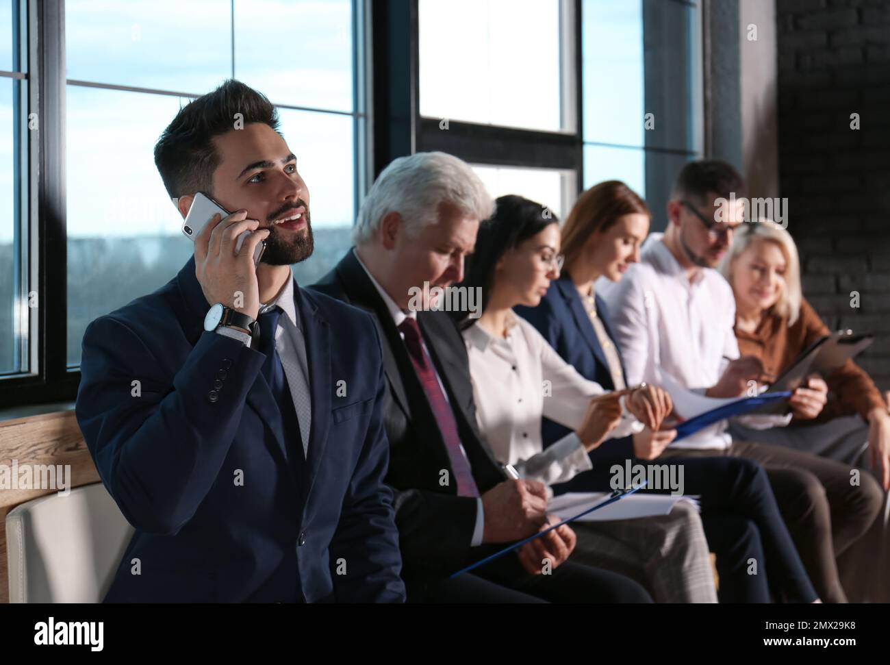 Senior man interview talking hi-res stock photography and images - Alamy