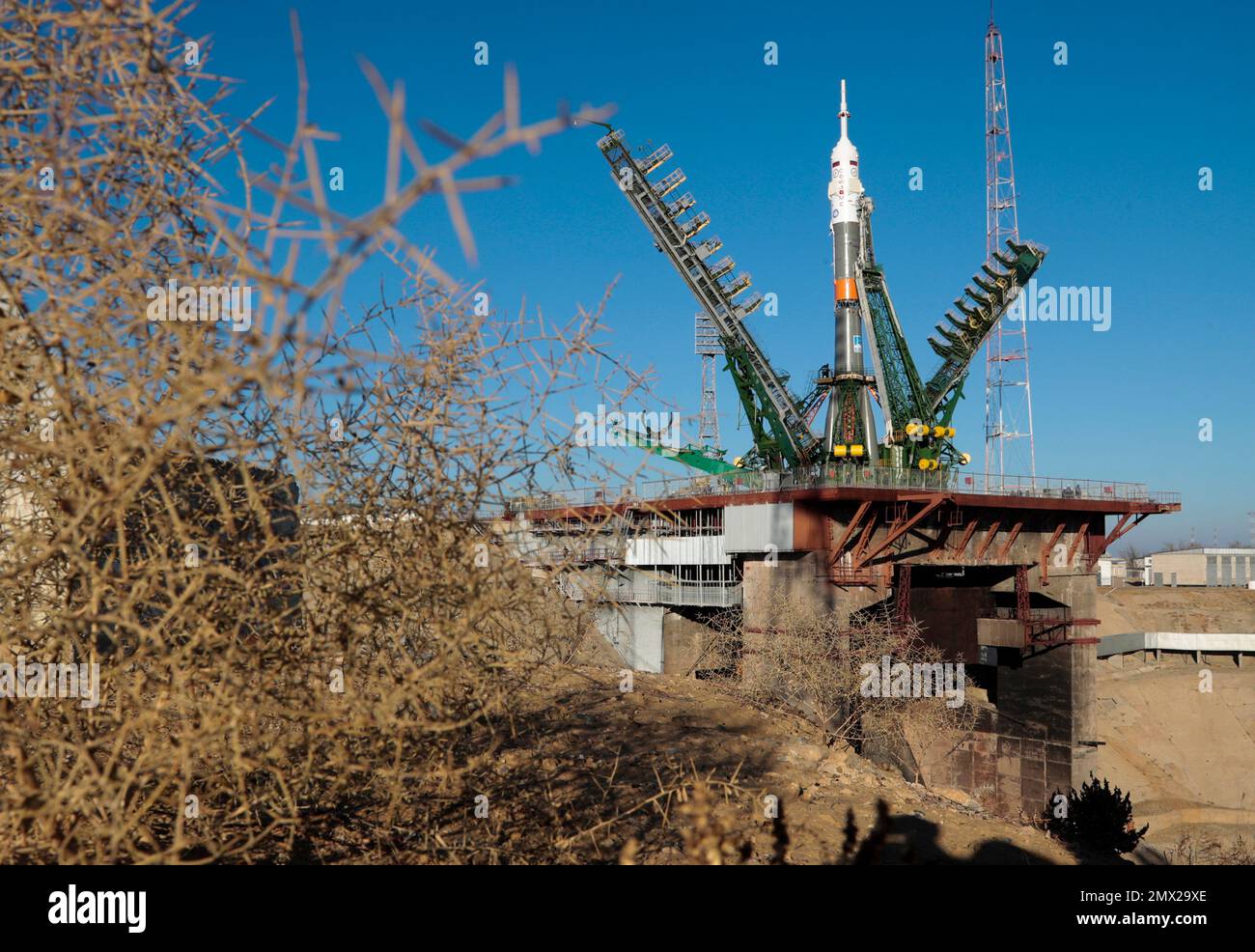 Service towers lift towards Russia's Soyuz-FG booster rocket with the ...