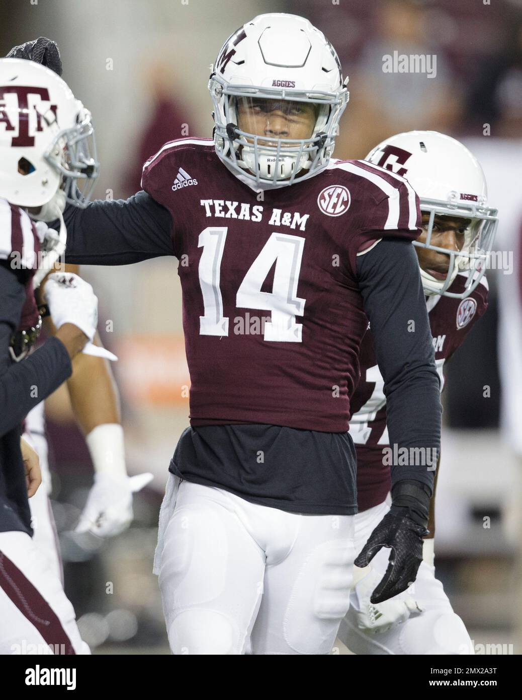 Texas A&M defensive back Justin Evans (14) goes through drills before ...
