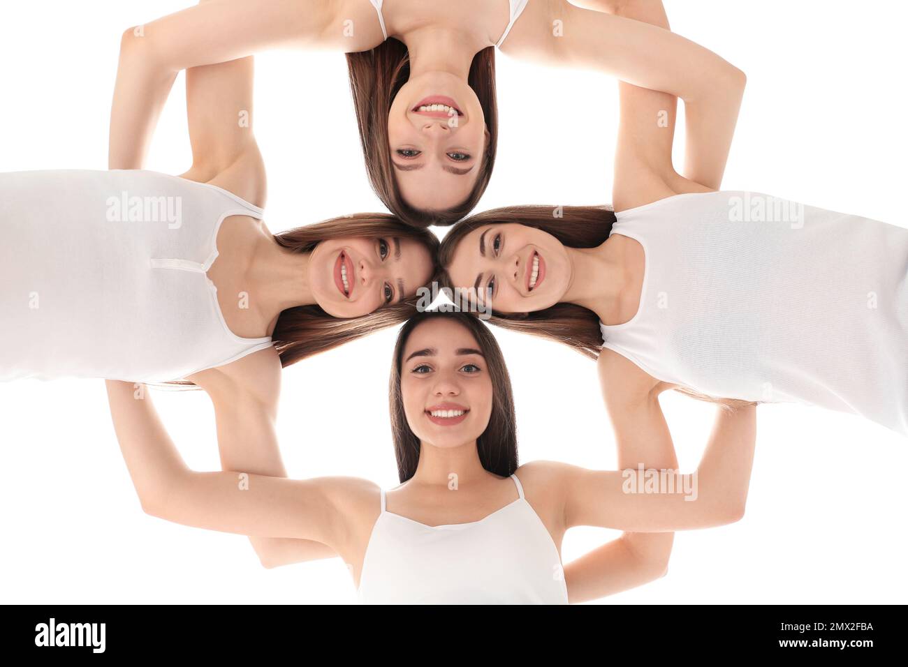 Beautiful young ladies hugging, bottom view. Woman's Day Stock Photo ...