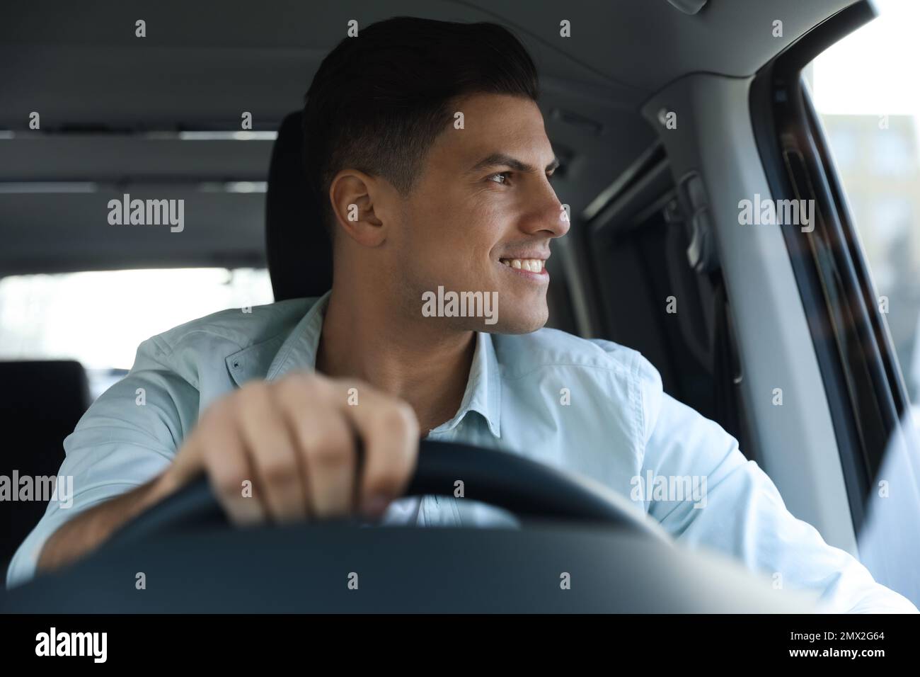 Handsome guy driving van hi-res stock photography and images - Alamy