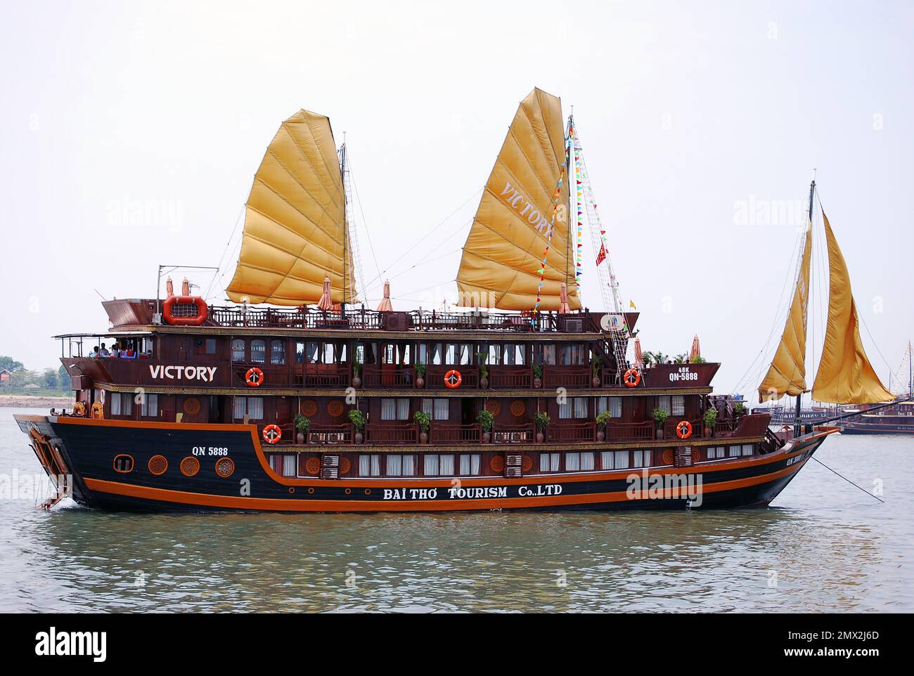 Cruising among beautiful limestone rocks in Ha Long bay, UNESCO world ...