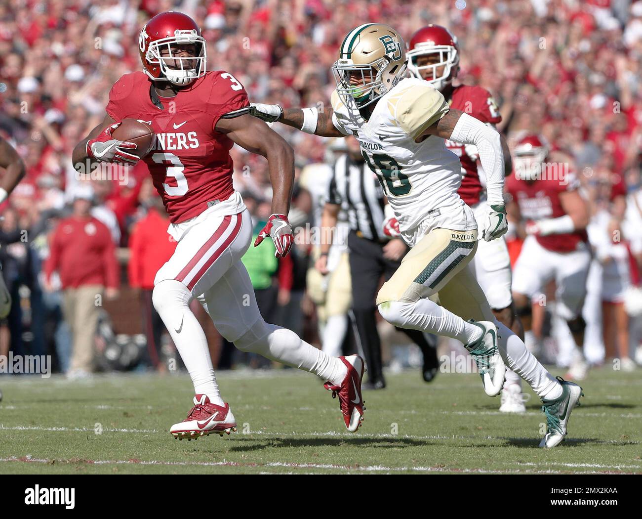 Oklahoma wide receiver Mykel Jones (3) runs ahead of Baylor safety ...