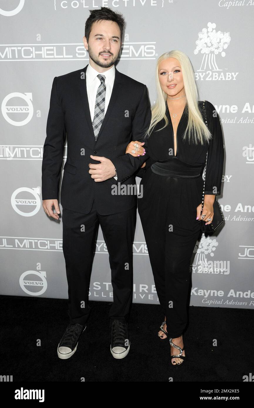 Christina Aguilera, right, and Matt Rutler attend the 5th Annual ...
