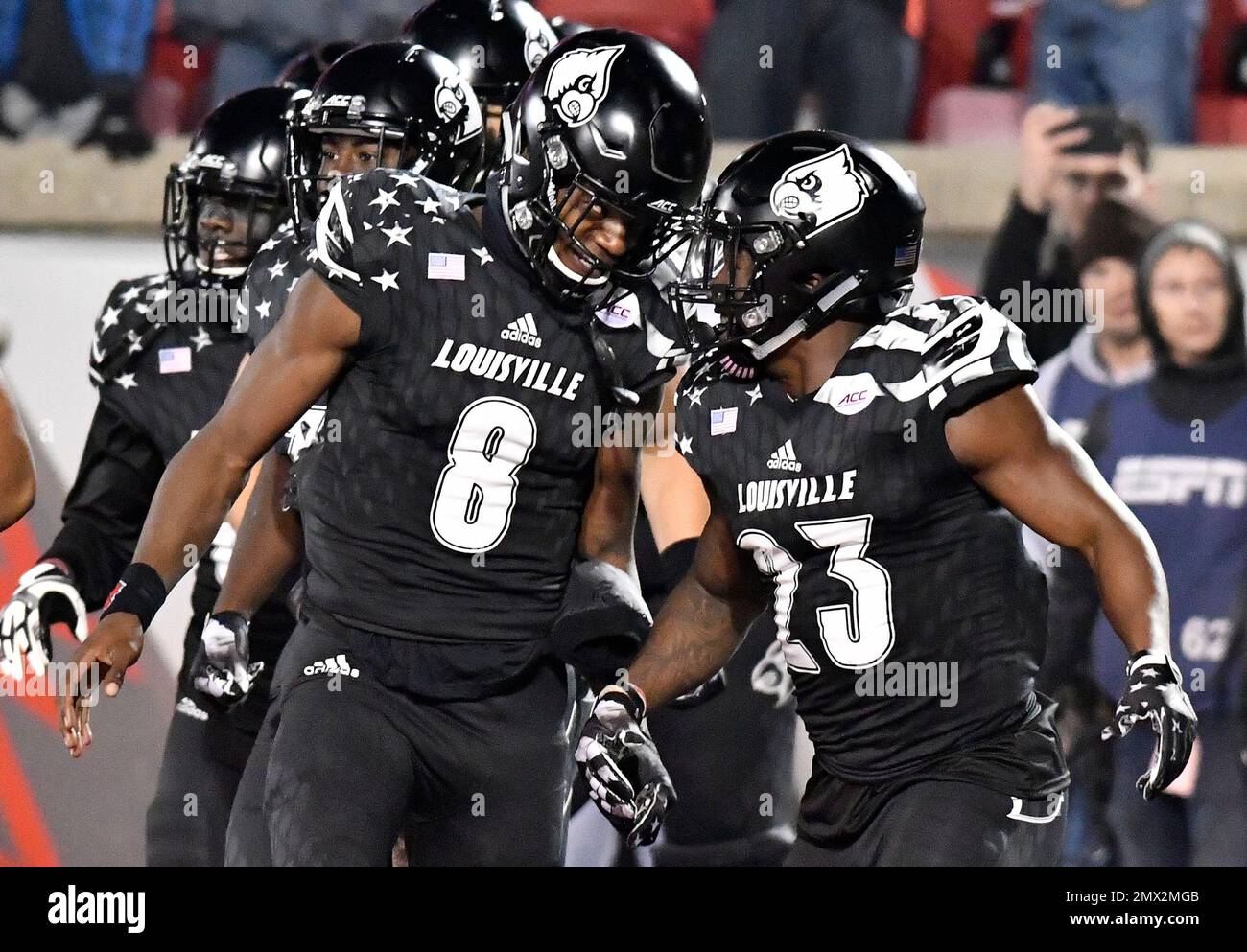 Louisville quarterback Lamar Jackson (8) and Brandon Radcliff (23 ...