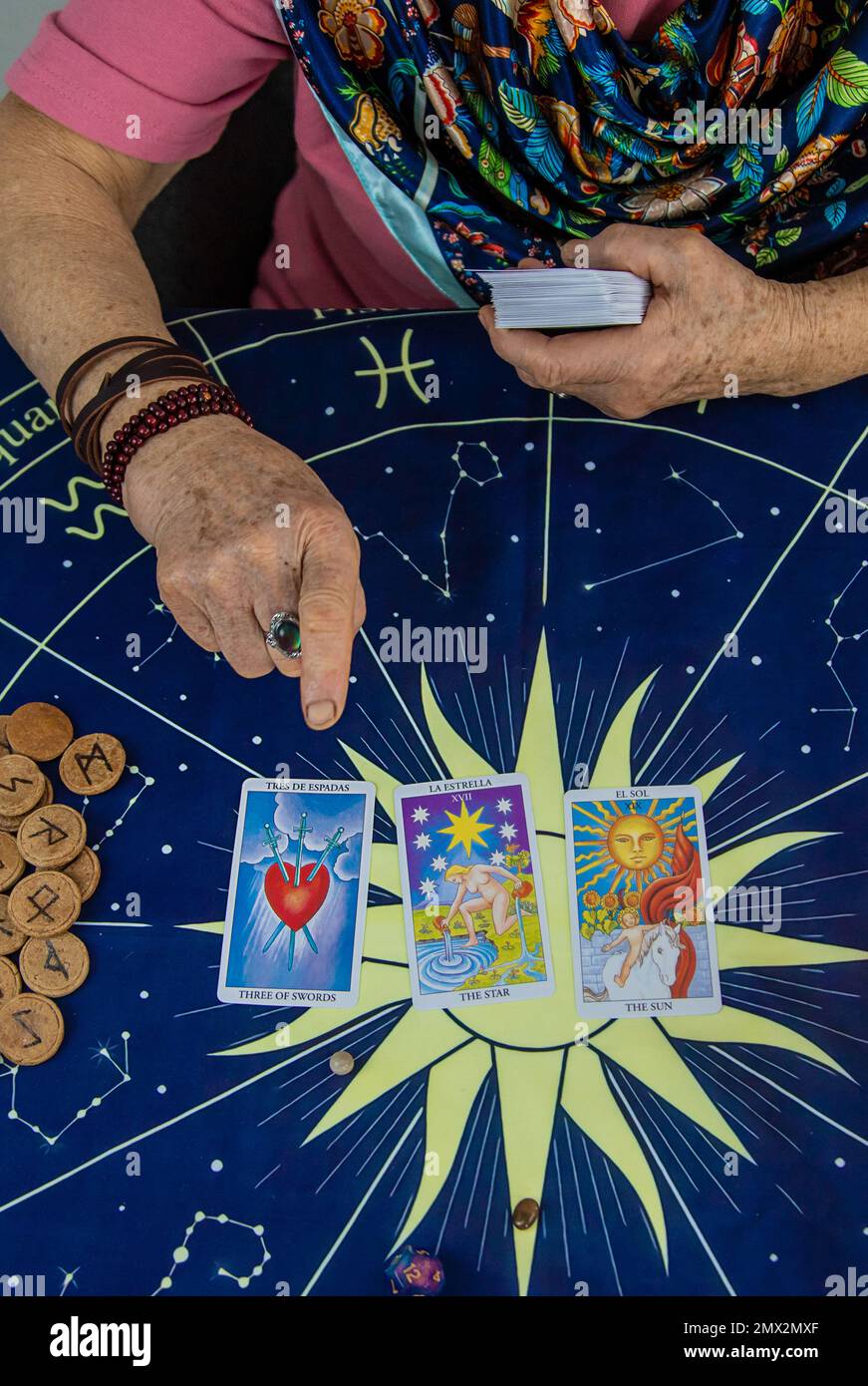 Fortune teller reads tarot cards. selective focus. Old Stock Photo - Alamy