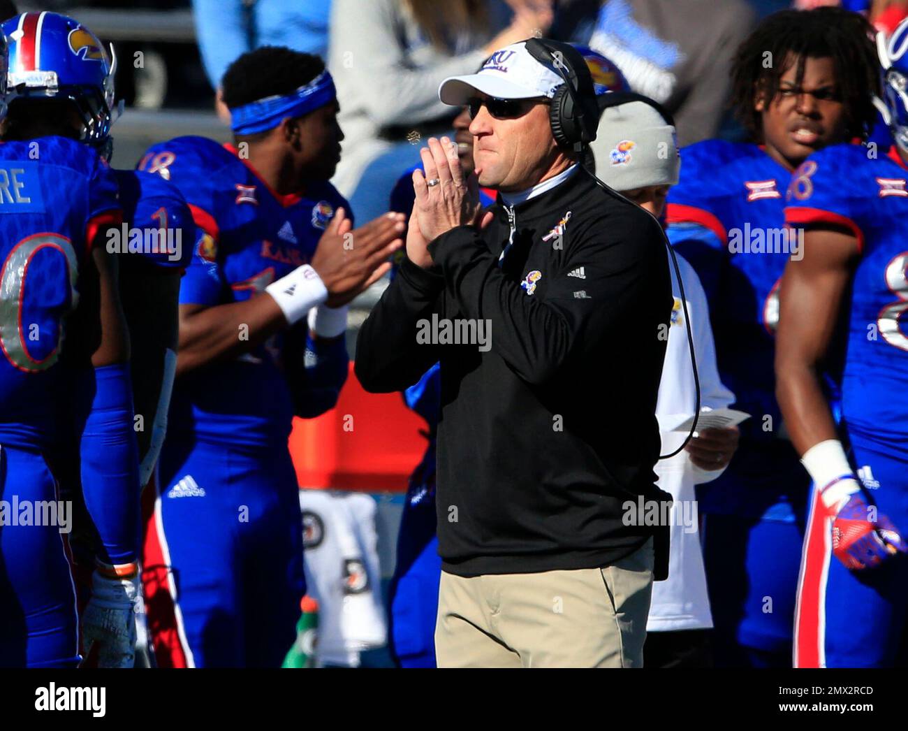 Kansas head coach David Beaty applauds his team during the first half ...