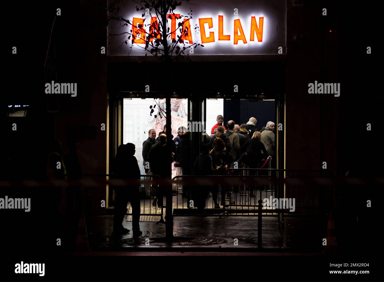 People enter the Bataclan concert hall in Paris, Saturday, Nov. 12 ...