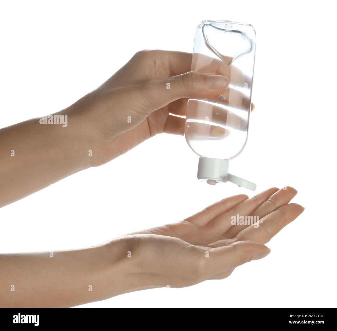 Woman applying antibacterial hand gel against white background, closeup ...