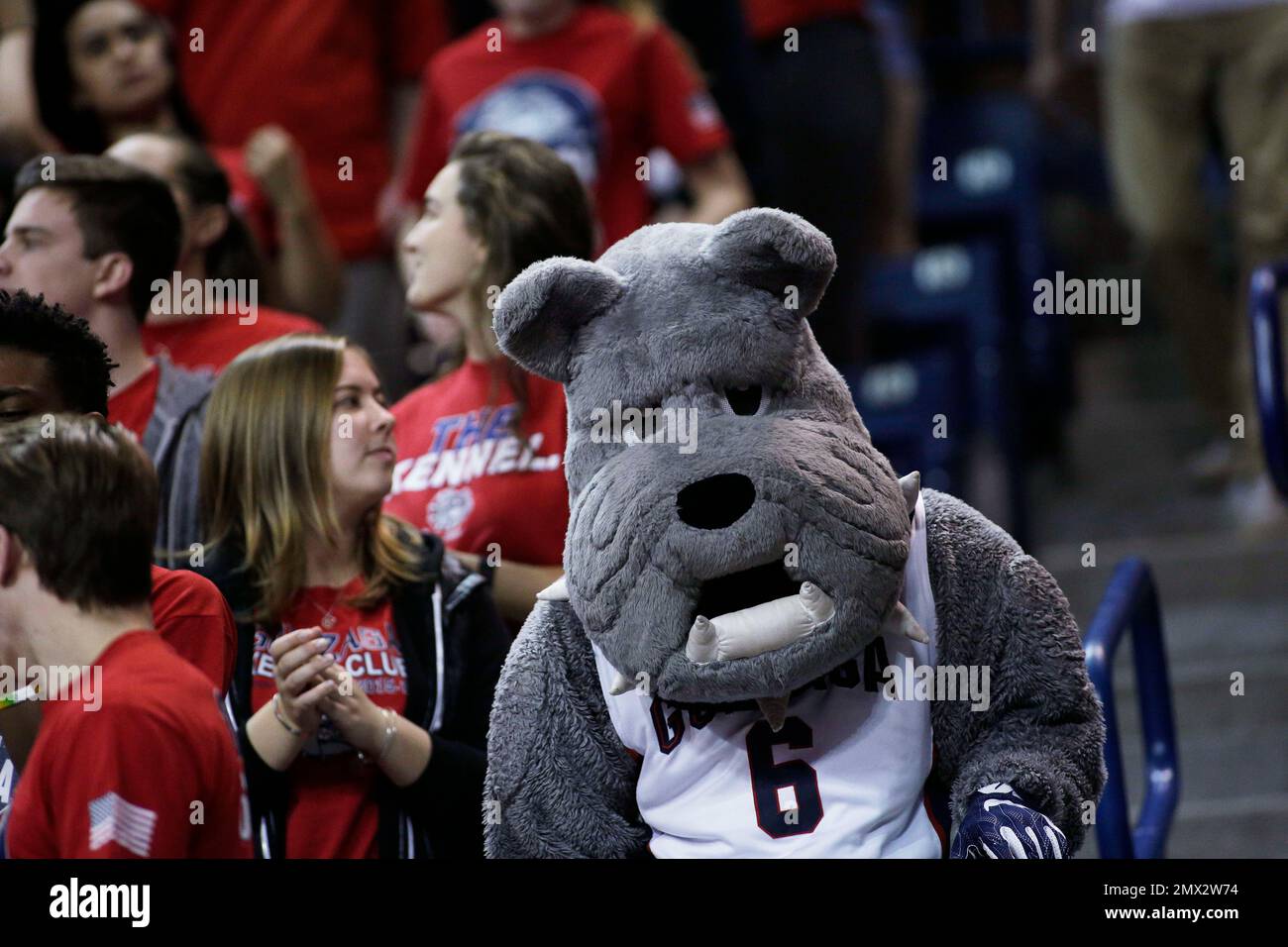 The Gonzaga mascot walks down stairs before an NCAA college basketball ...