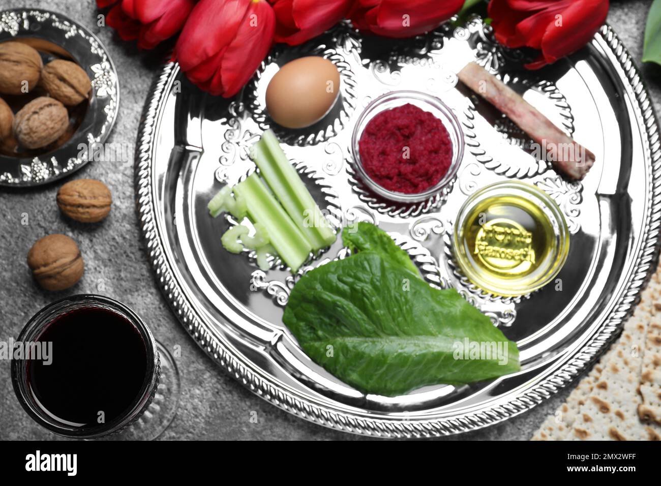 Flat lay composition with Passover Seder plate (keara) on grey table ...