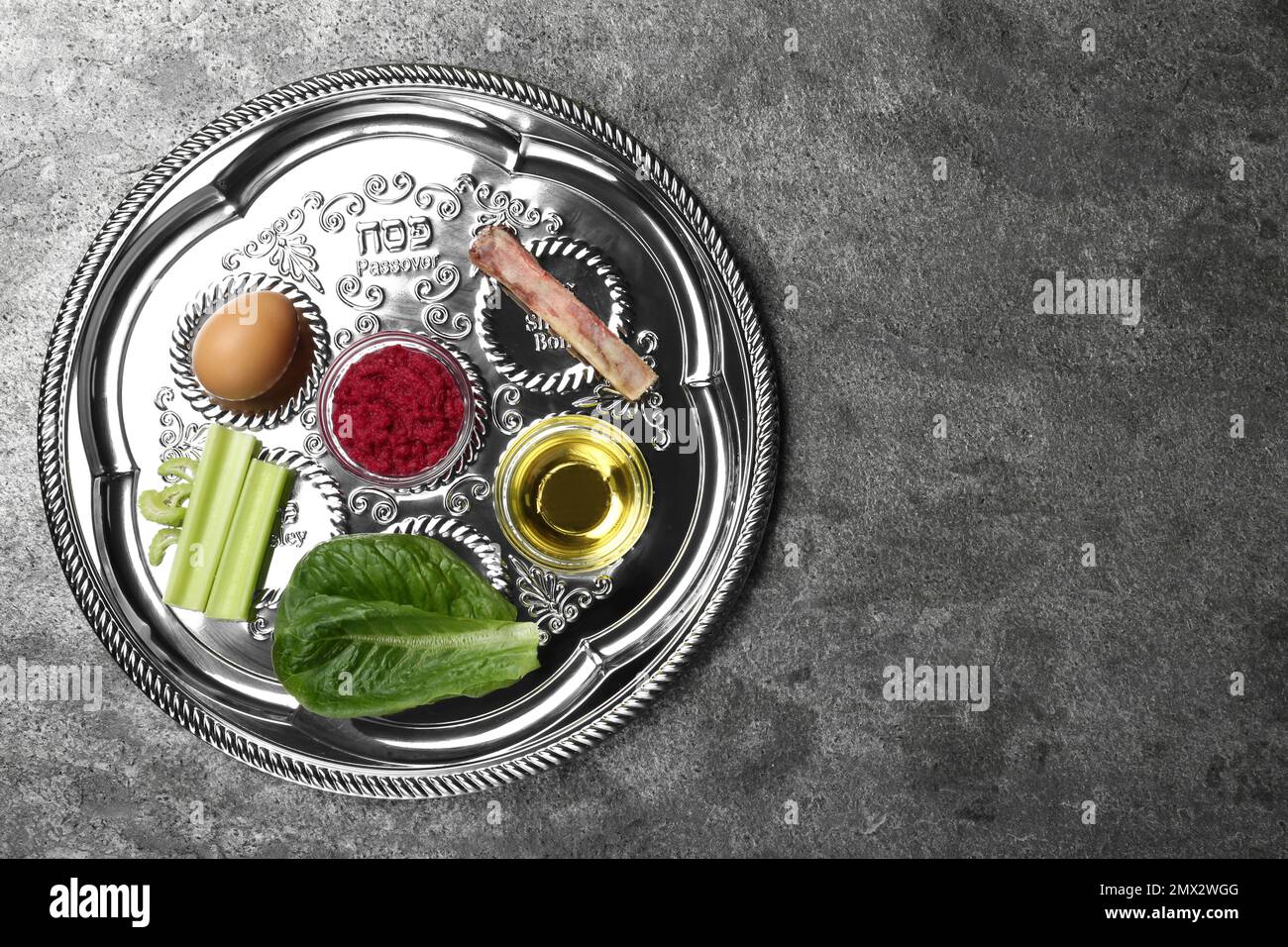 Passover Seder plate (keara) on grey table, top view with space for ...