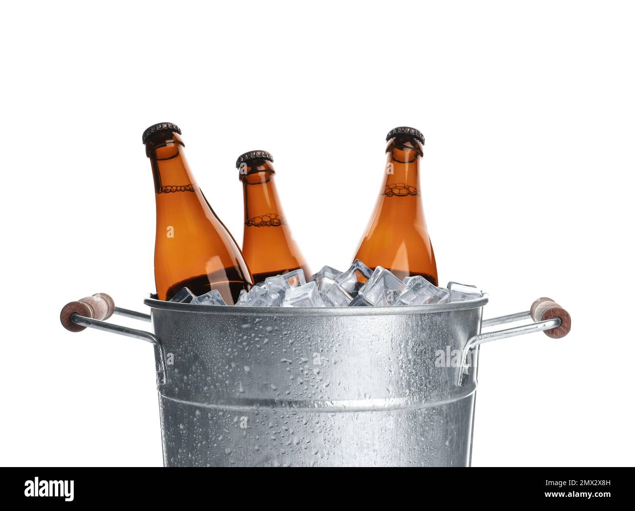 Metal bucket with bottles of beer and ice cubes isolated on white Stock ...