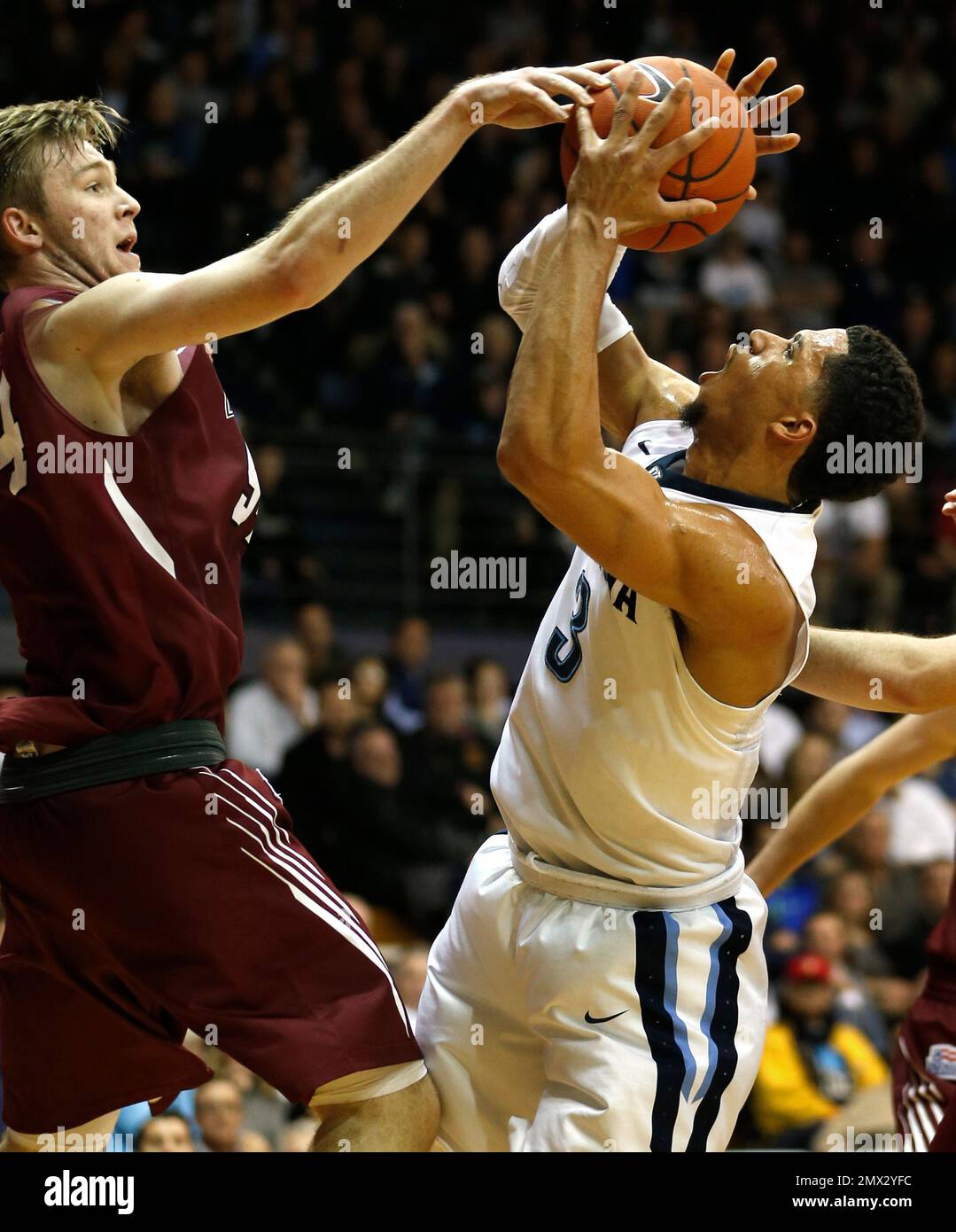 Lafayette forward Myles Cherry (54) blocks a shot by Villanova guard ...