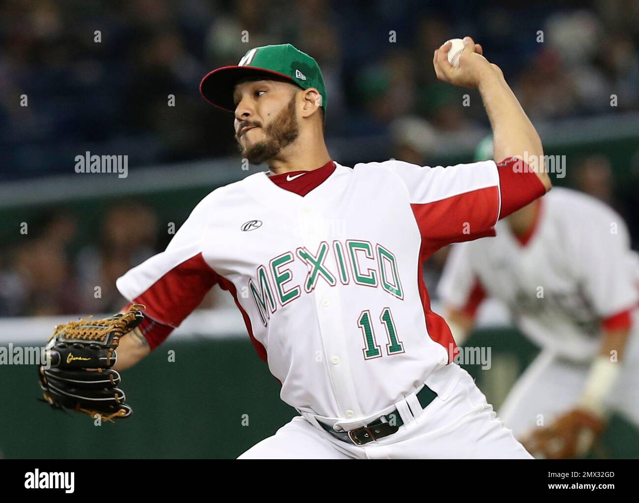 Mexico's starter Hector Daniel Rodriguez pitches against Japan in the ...