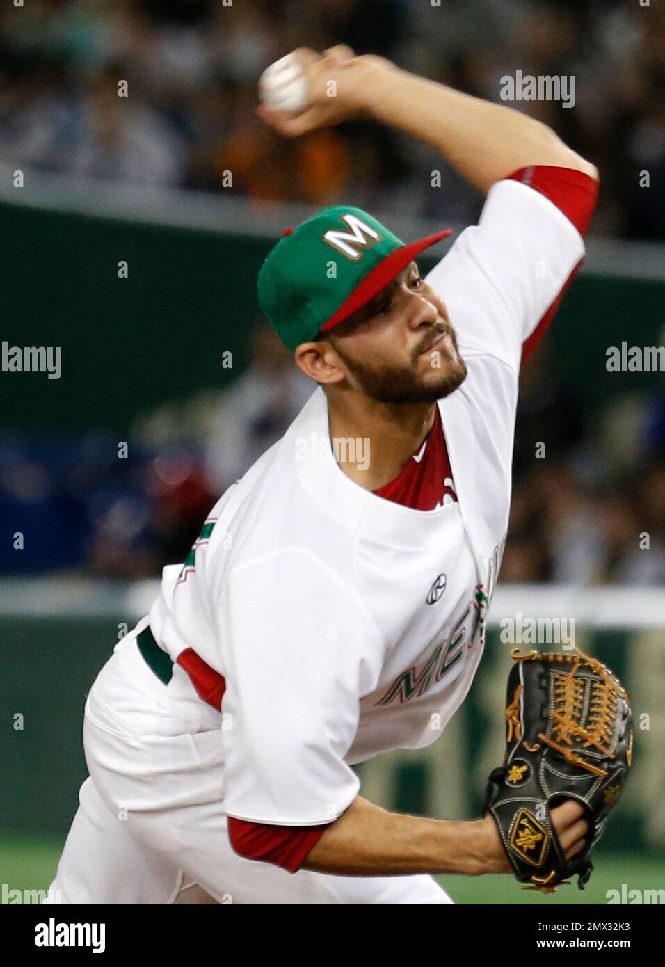 Mexico's starter Hector Daniel Rodriguez pitches against Japan in the ...