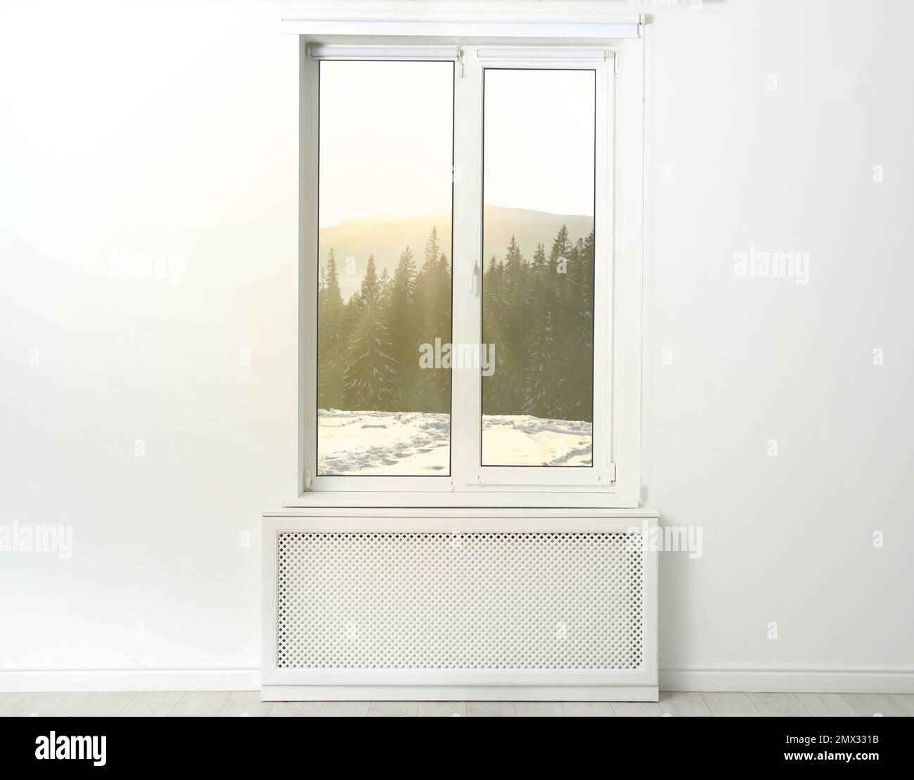 Beautiful view of snowy forest through big window Stock Photo - Alamy