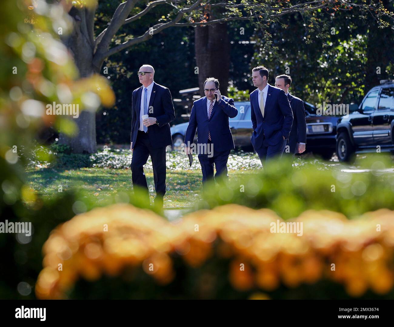 Members of with President-elect Donald Trump's staff, from left, Keith ...