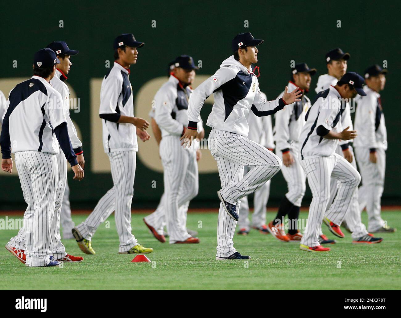 Team Japan’s pitcher Shohei Otani warms up prior to an international ...
