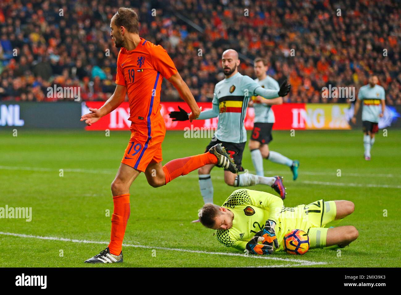 Belgium's goalkeeper Simon Mignolet saves before Netherlands' Bas Dost ...