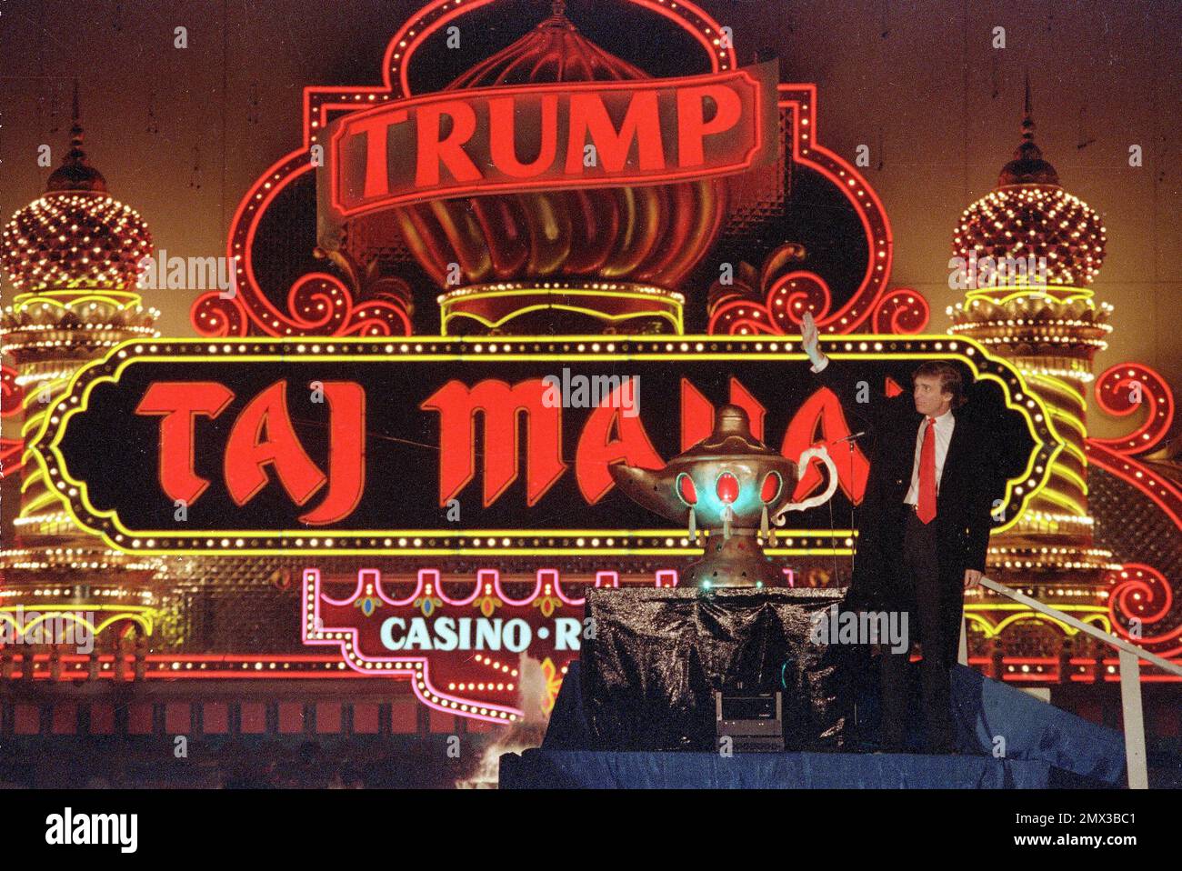 FILE - In this April 5, 1990 file photo, Donald Trump stands next to a ...