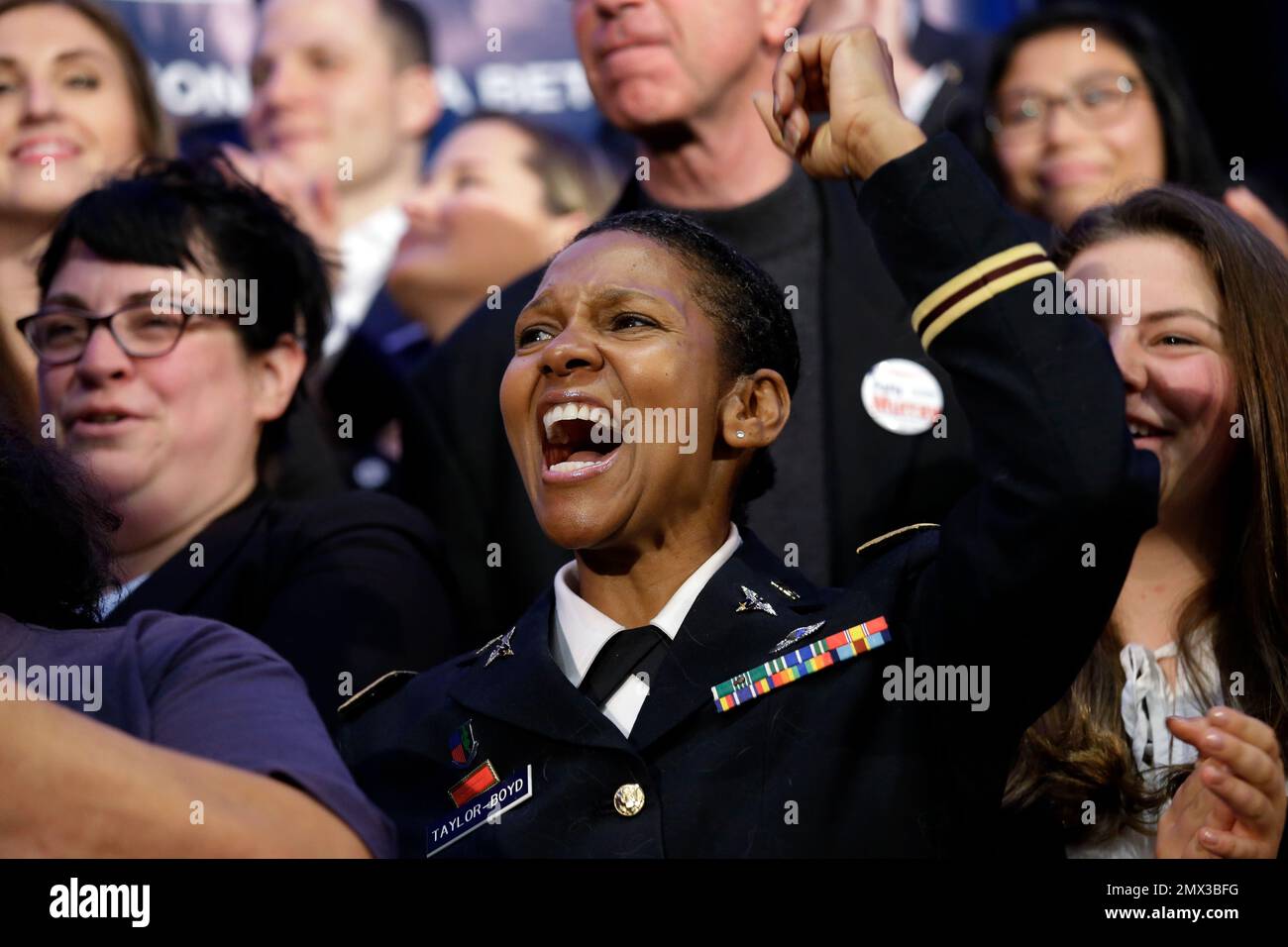 Retired U.S. Army Capt. Shanda Taylor-Boyd cheers at an election night ...