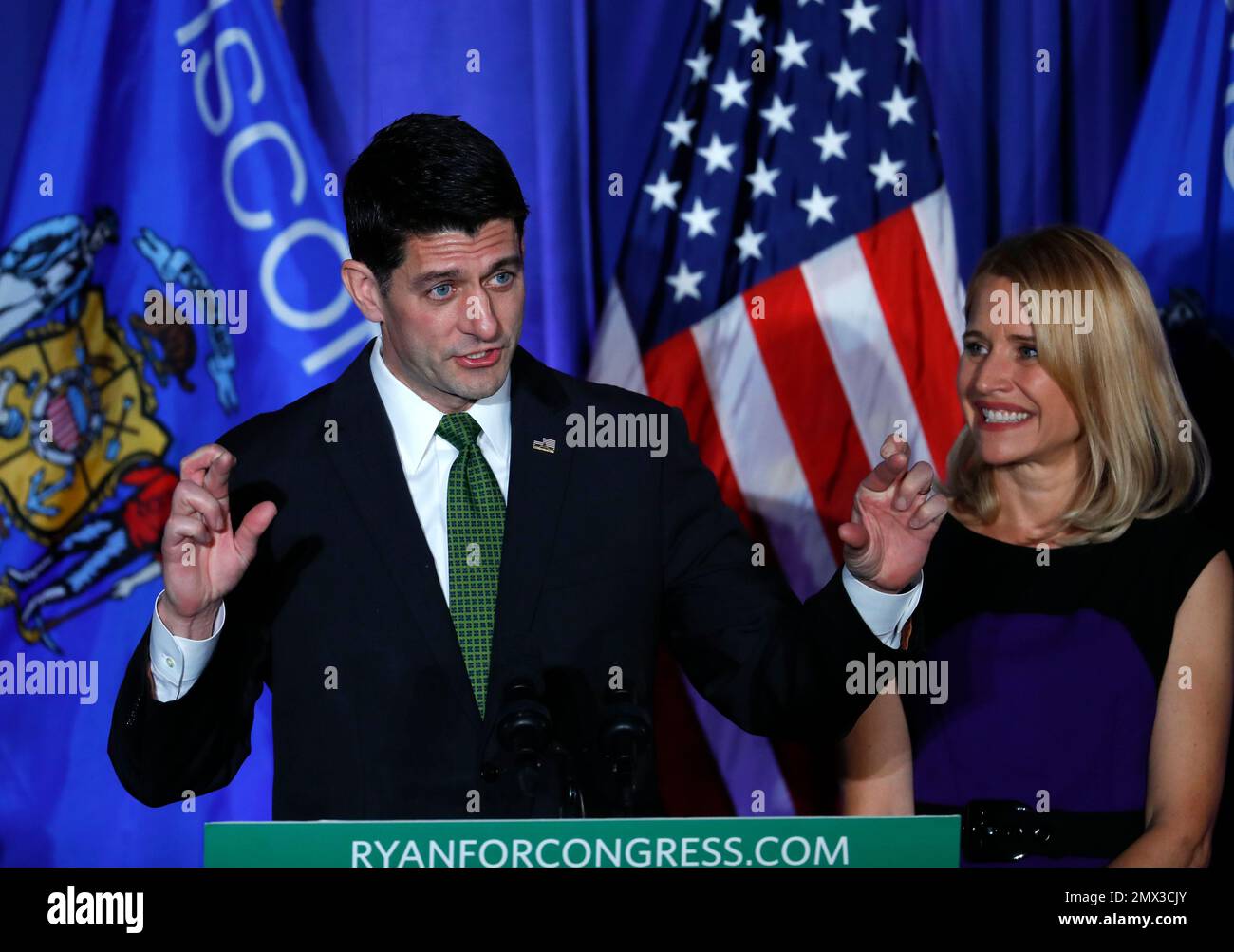House Speaker Paul Ryan of Wisconsin crosses his fingers while speaking ...