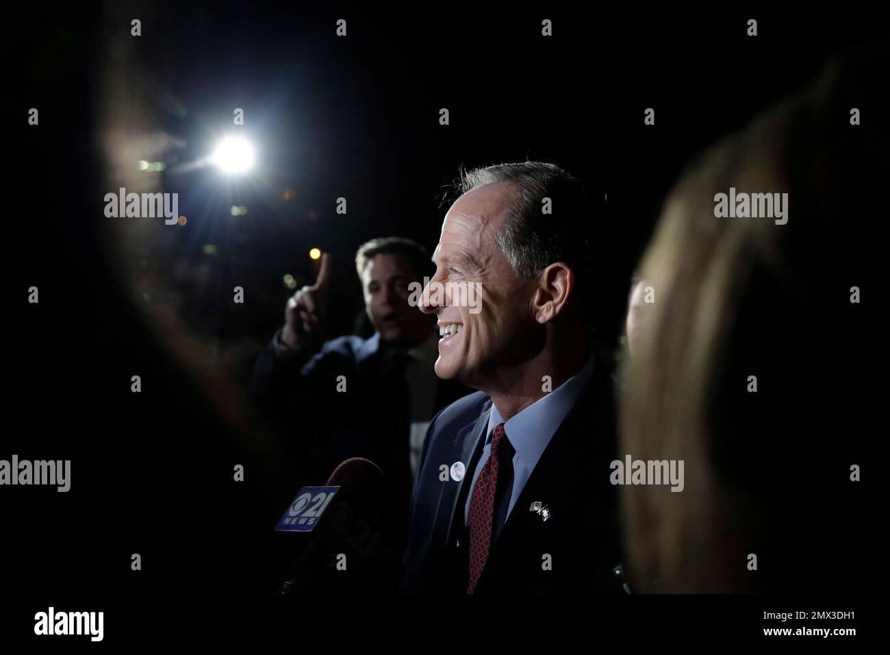 Sen. Pat Toomey, R-Pa. smiles as he talks with the media after voting ...