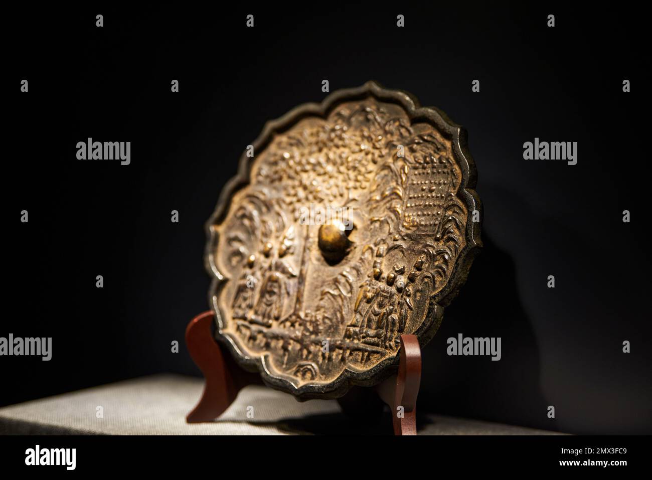 A close-up of a bronze mirror relic used in ancient China Stock Photo ...