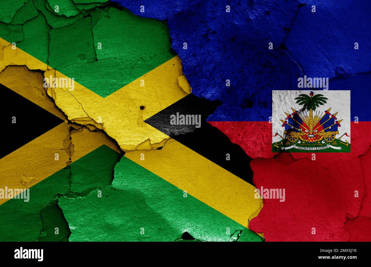 flags of Jamaica and Haiti painted on cracked wall Stock Photo - Alamy