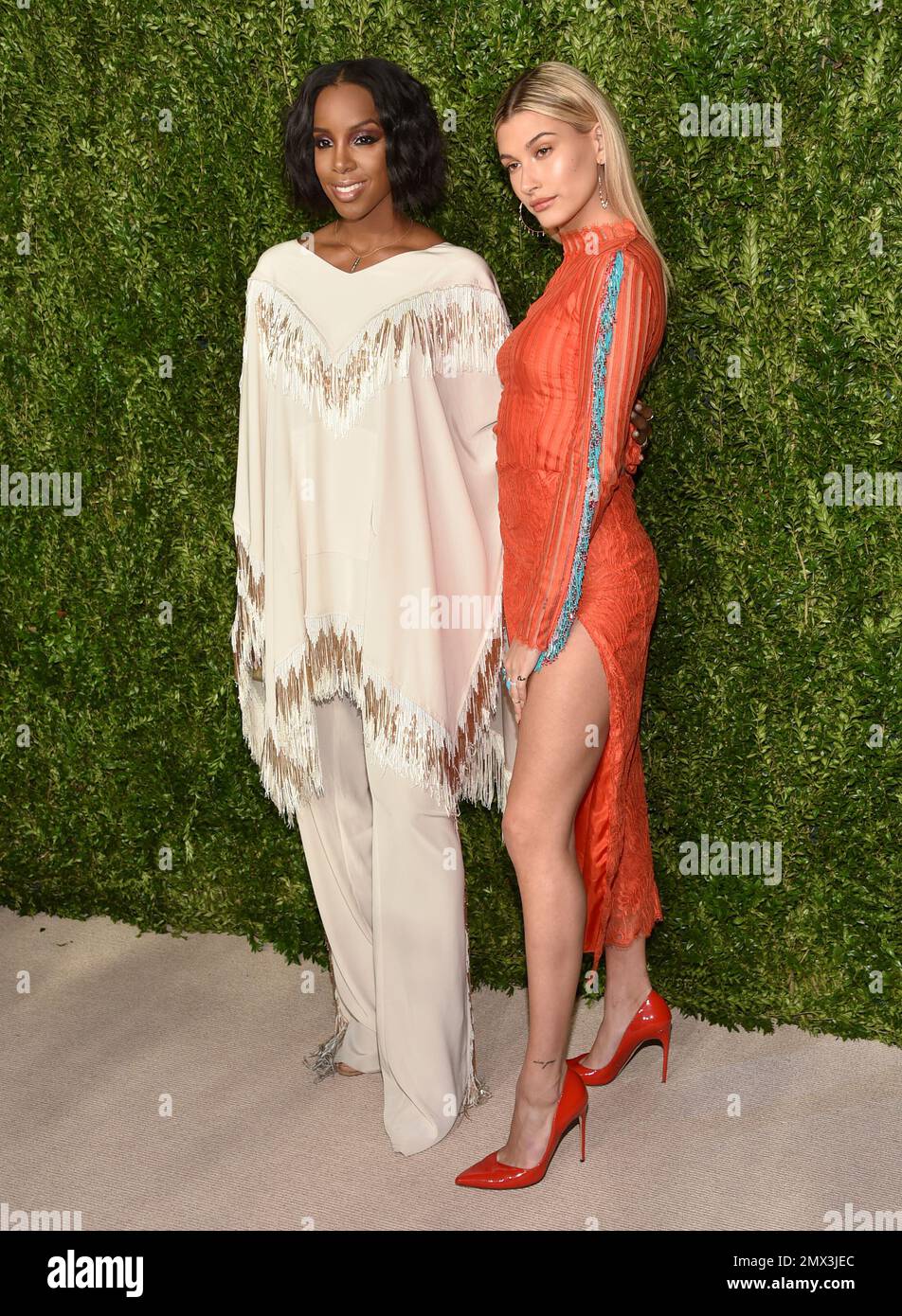 Kelly Rowland, left, and Hailey Baldwin attend the 13th Annual CFDA ...