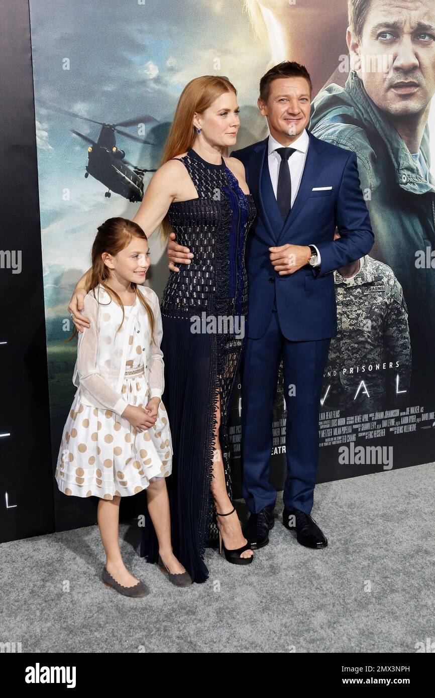 Abigail Pniowsky, from left, Amy Adams and Jeremy Renner arrive at the ...
