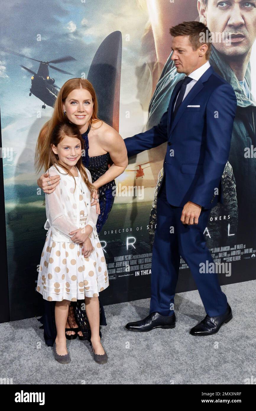 Abigail Pniowsky, from left, Amy Adams and Jeremy Renner arrive at the ...